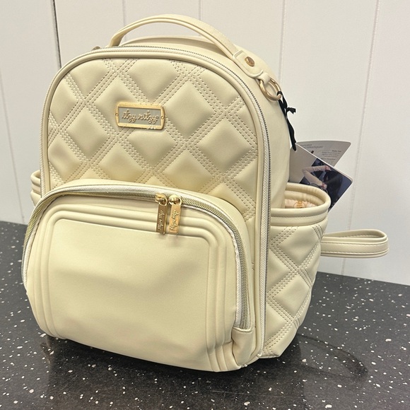 Itzy Ritzy | Bags | Itzy Ritzy Milk Honey Itzy Mini Plus Quilted Cream ...
